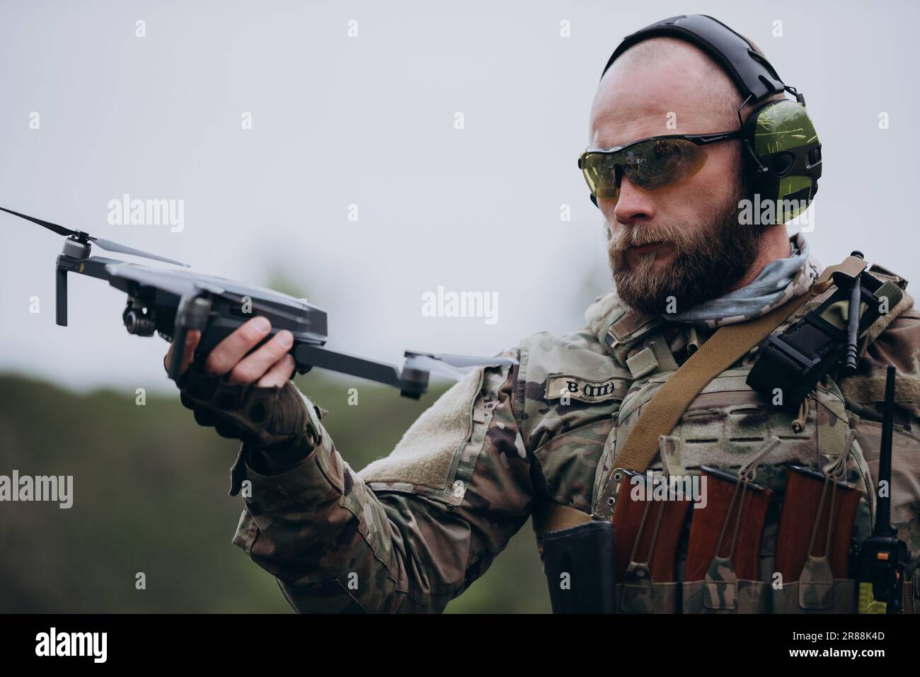 Portrait of Ukrainian Air Intelligence soldier holding a drone Stock ...