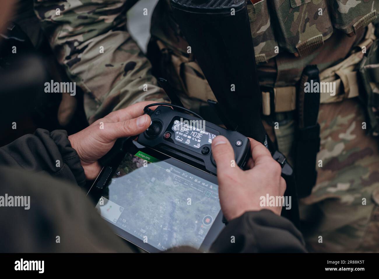 Ukrainian drone operator working with a tablet Stock Photo - Alamy