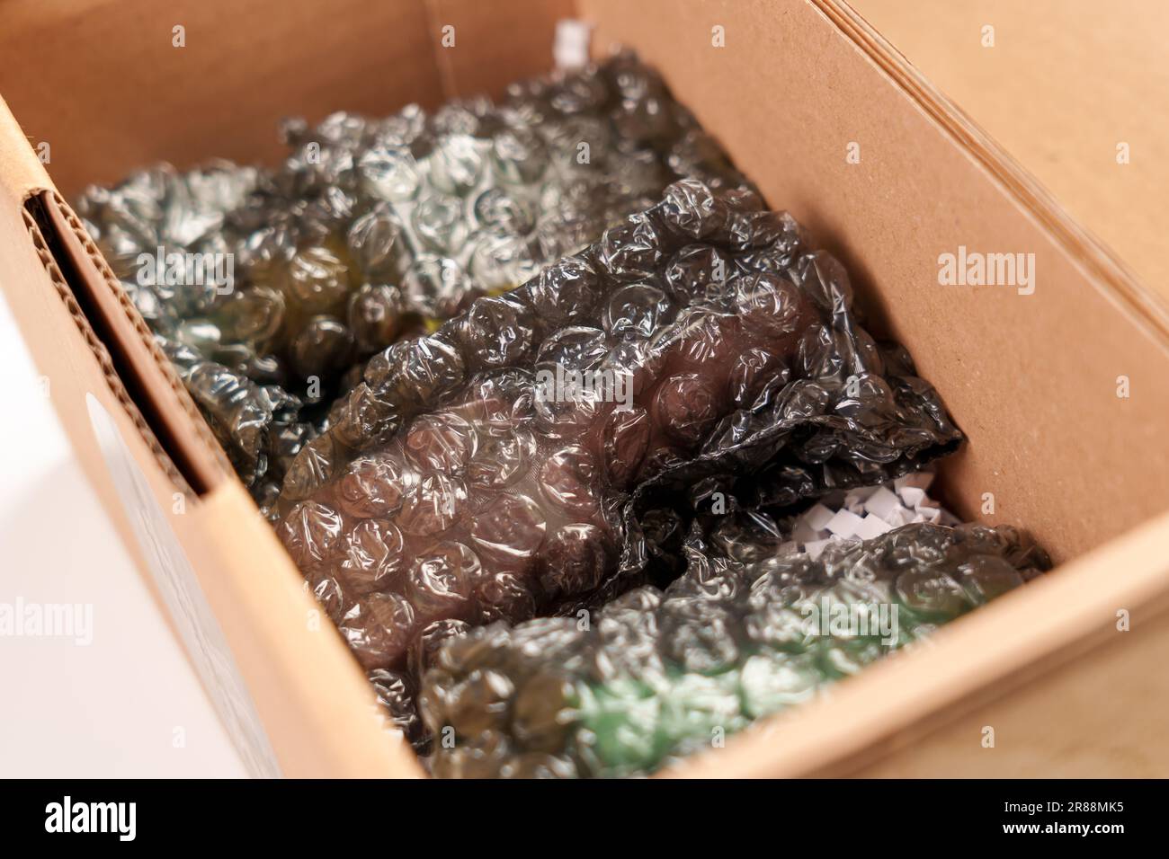 Full mail parcel with wrapped gifts close up Stock Photo - Alamy