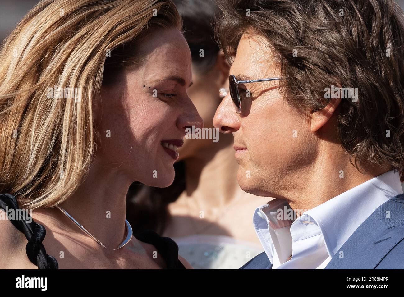 A glance between Rebecca Ferguson and Tom Cruise, during the Red Carpet ...