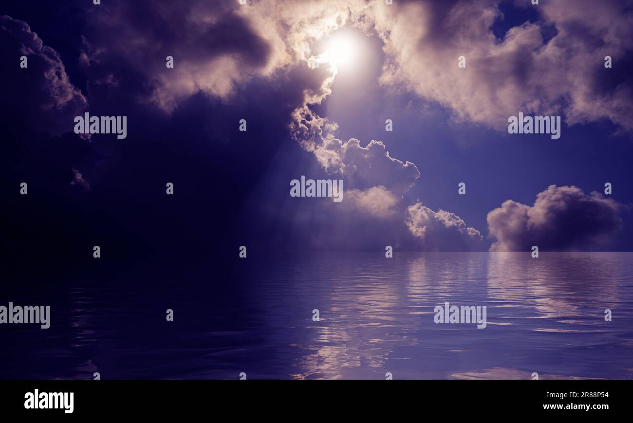 Dramatic sunset with clouds reflected in water Stock Photo - Alamy