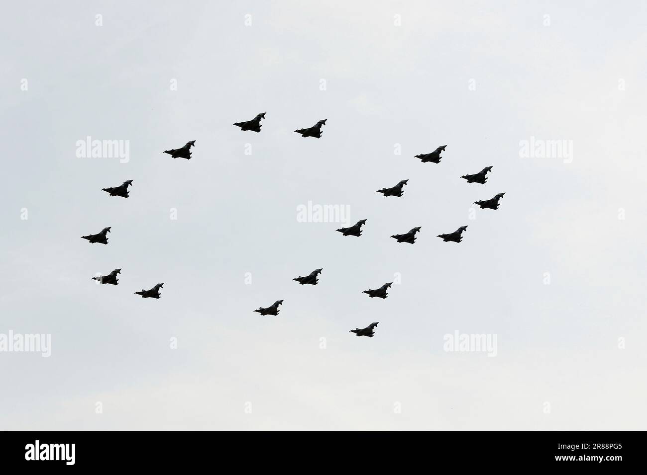 Eighteen Eurofighter Typhoon aircraft in formation spelling out CR ...