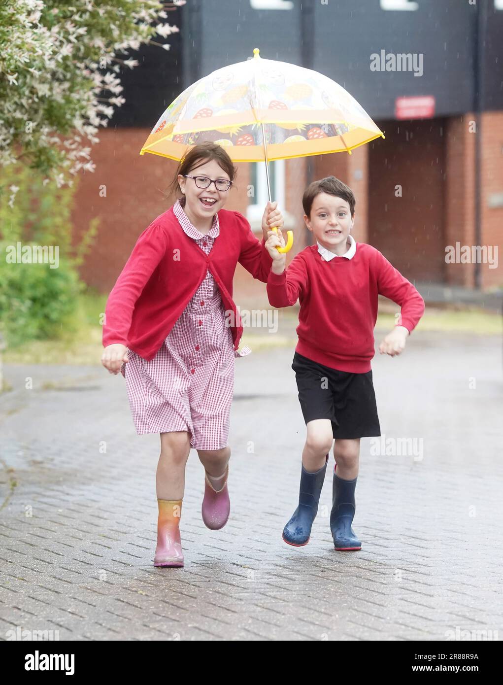 Haverhill, Suffolk, 20th June 2023. Ivy Mitchell, 7 and brother Albert ...