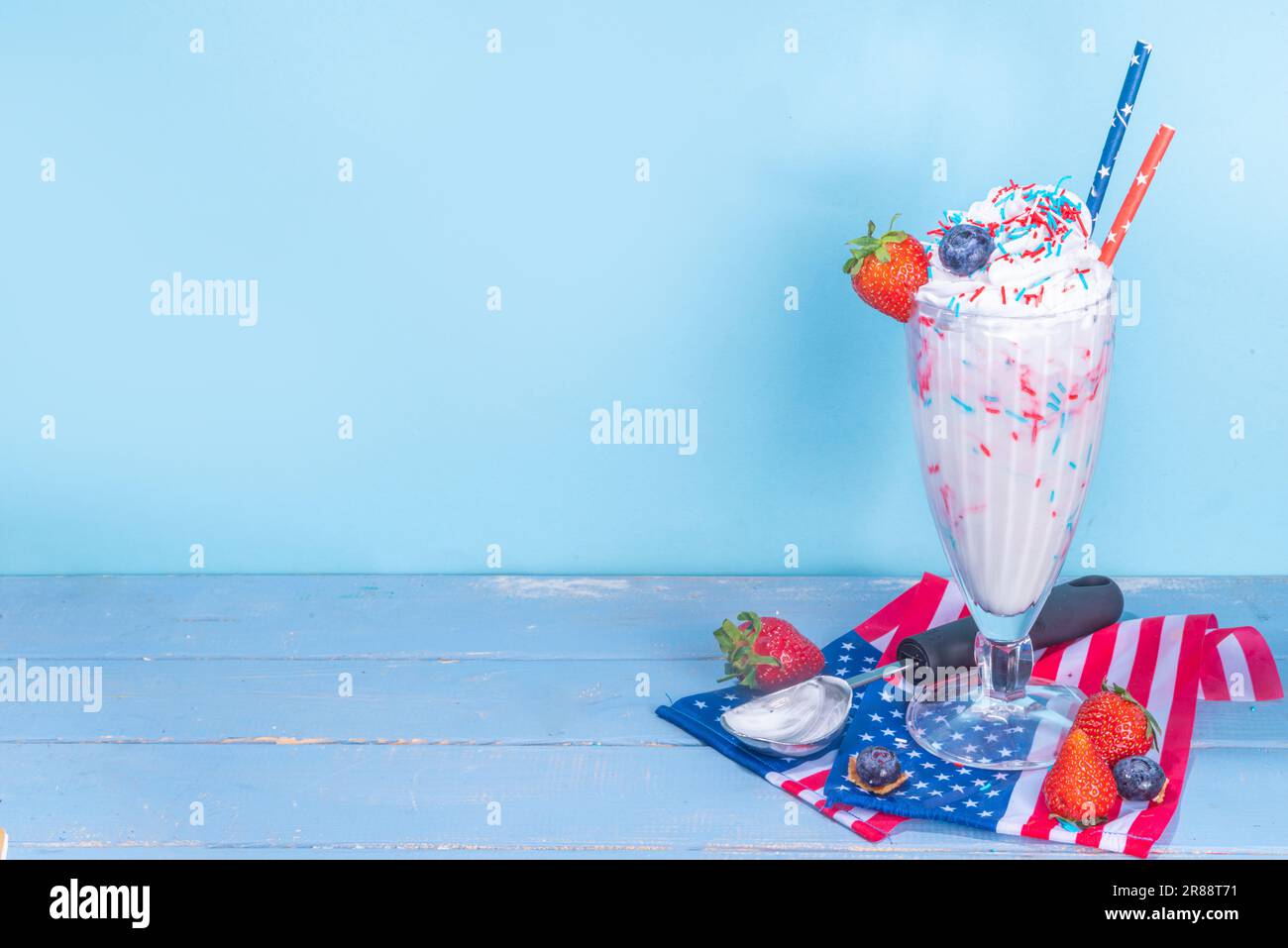 Patriotic USA American loaded milkshake, sweet dessert with red, white ...