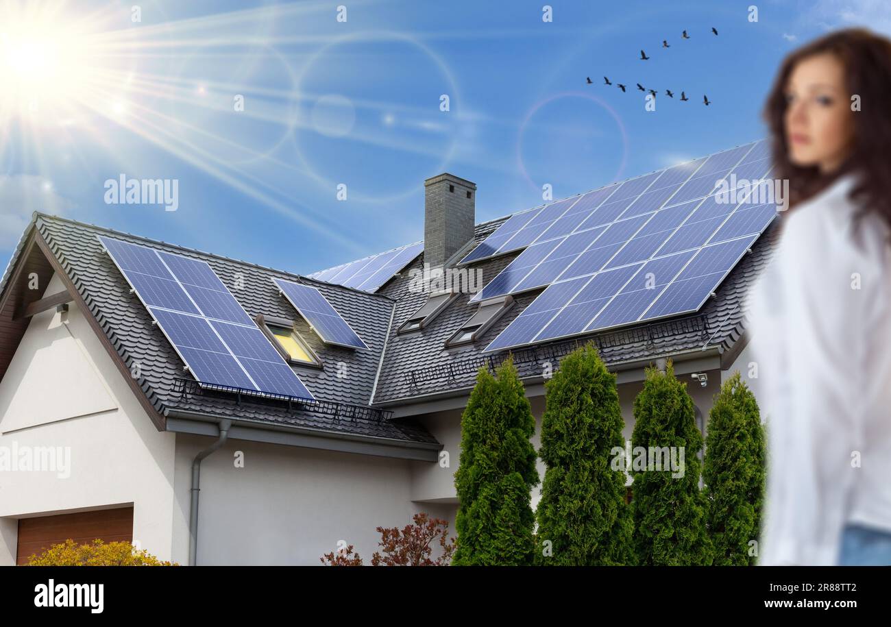 Solar panels on a gable roof. Beautiful, large modern house and solar ...