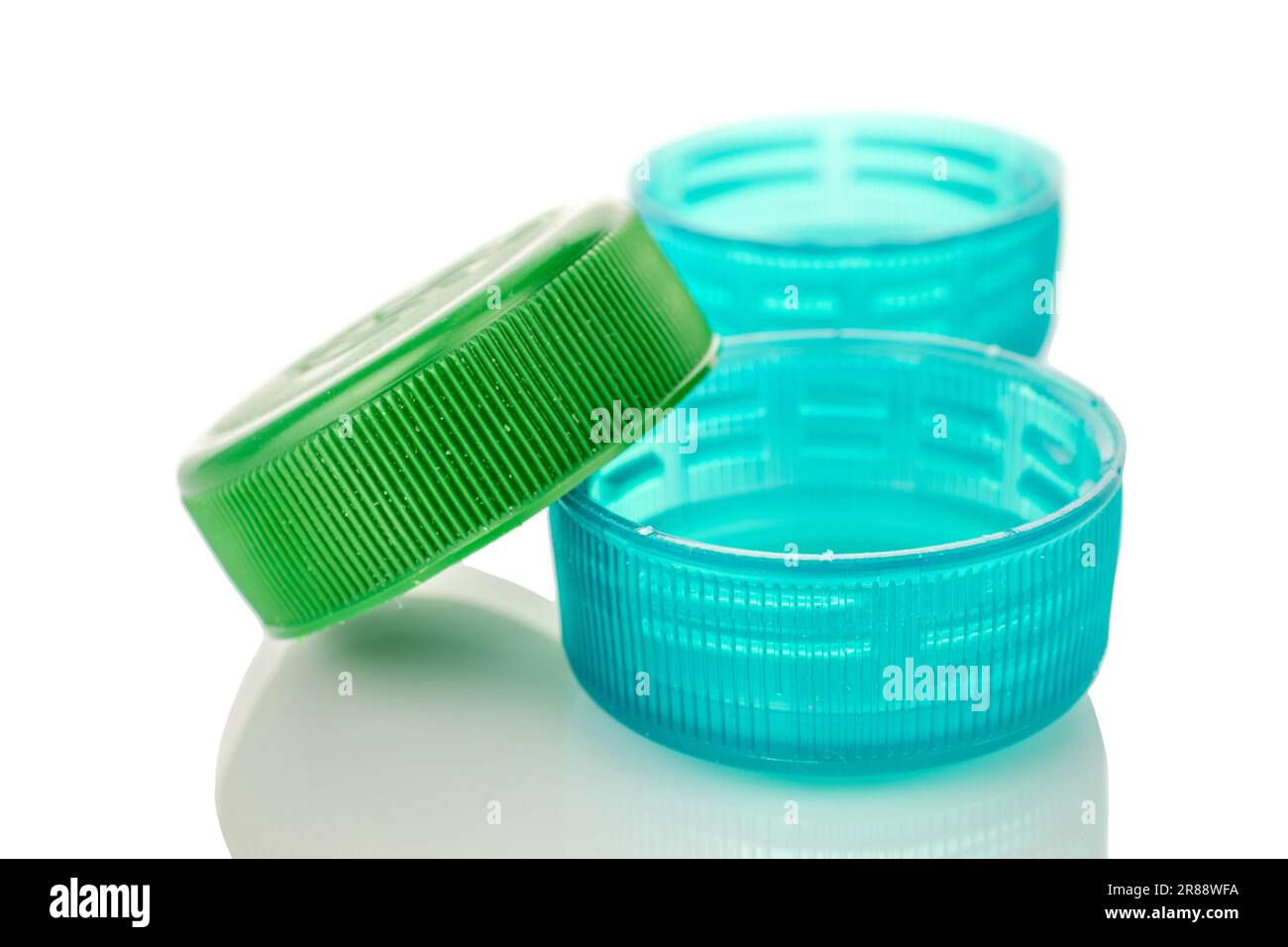 Three plastic bottle caps, macro, isolated on white background Stock ...
