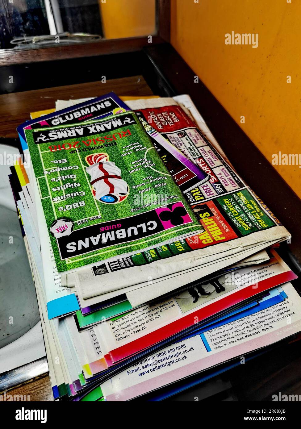 Old newspapers and magazines are scattered about SHEFFIELD, ENGLAND ...