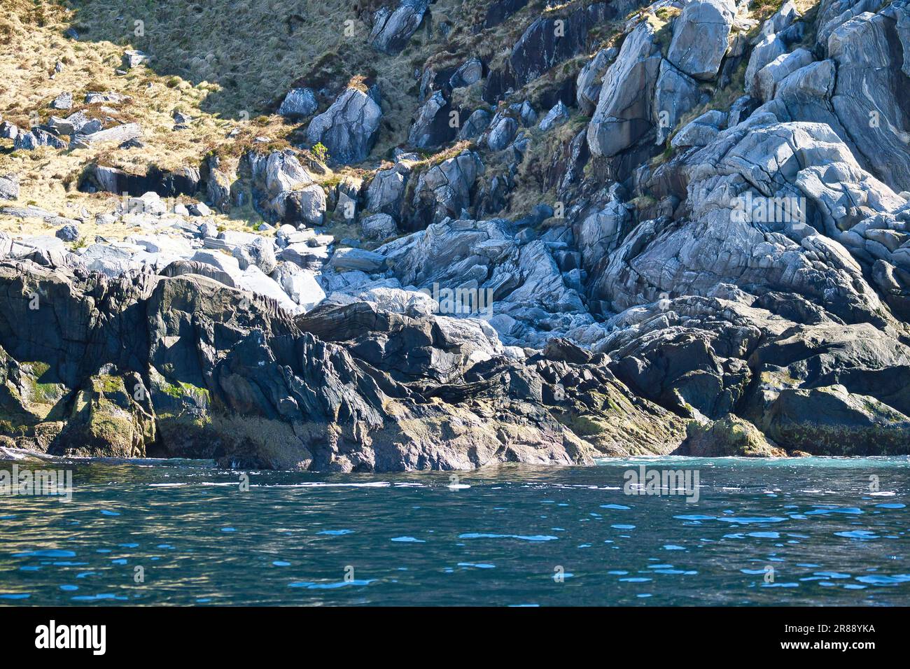 norway on the fjord, spray on rocks. Water splashes on the stones ...