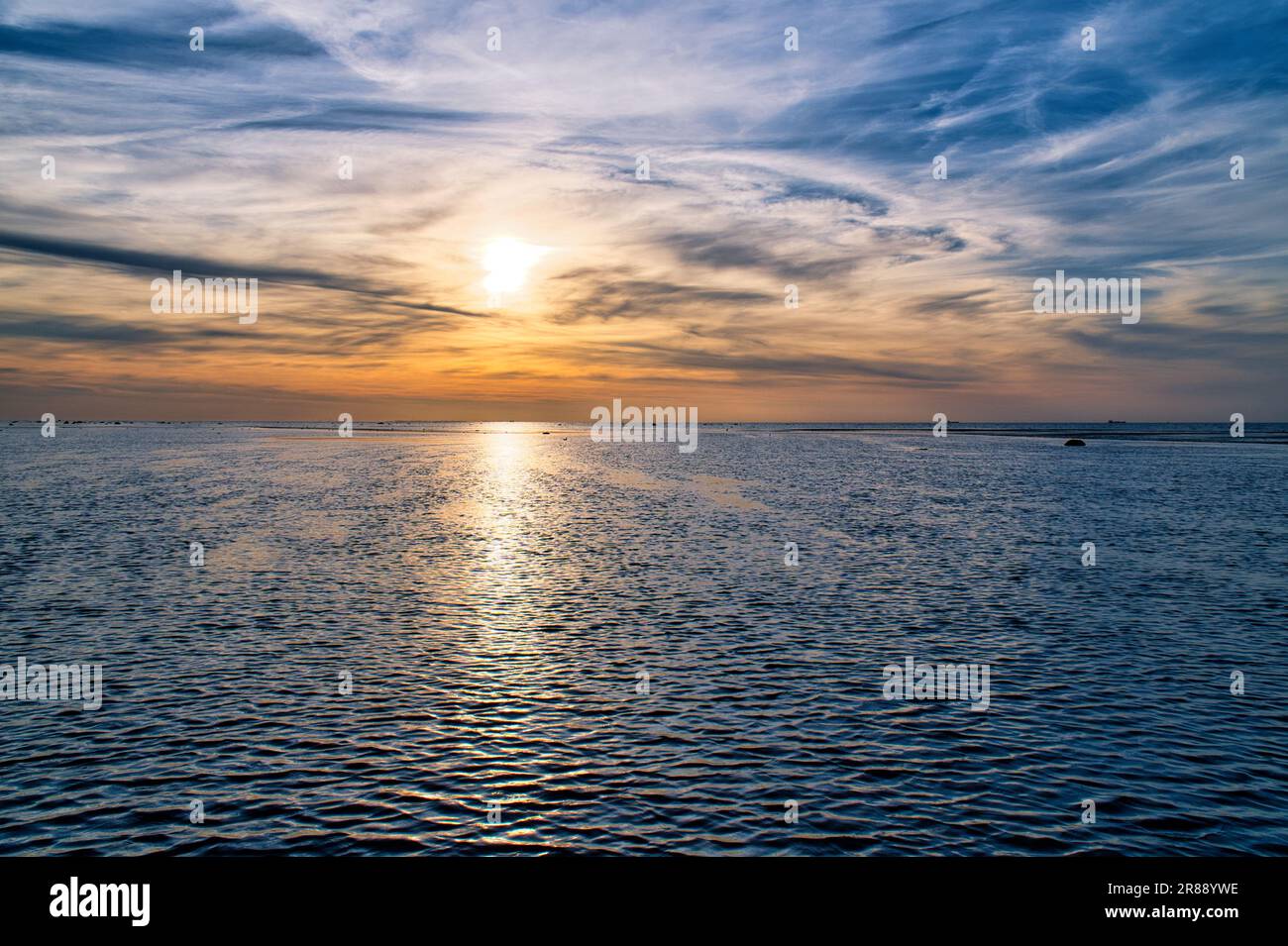 Sunset, illuminated sea. Light waves. Poel island on the Baltic Sea ...