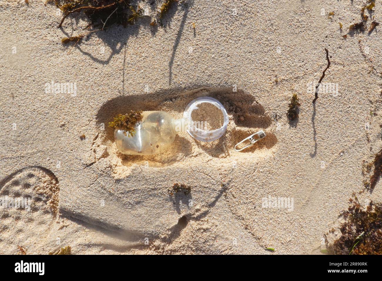 Footprint, human footprint with plastic waste Stock Photo - Alamy