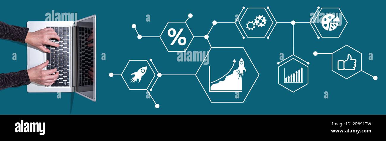 Top view of hands using laptop with symbol of growth concept Stock ...