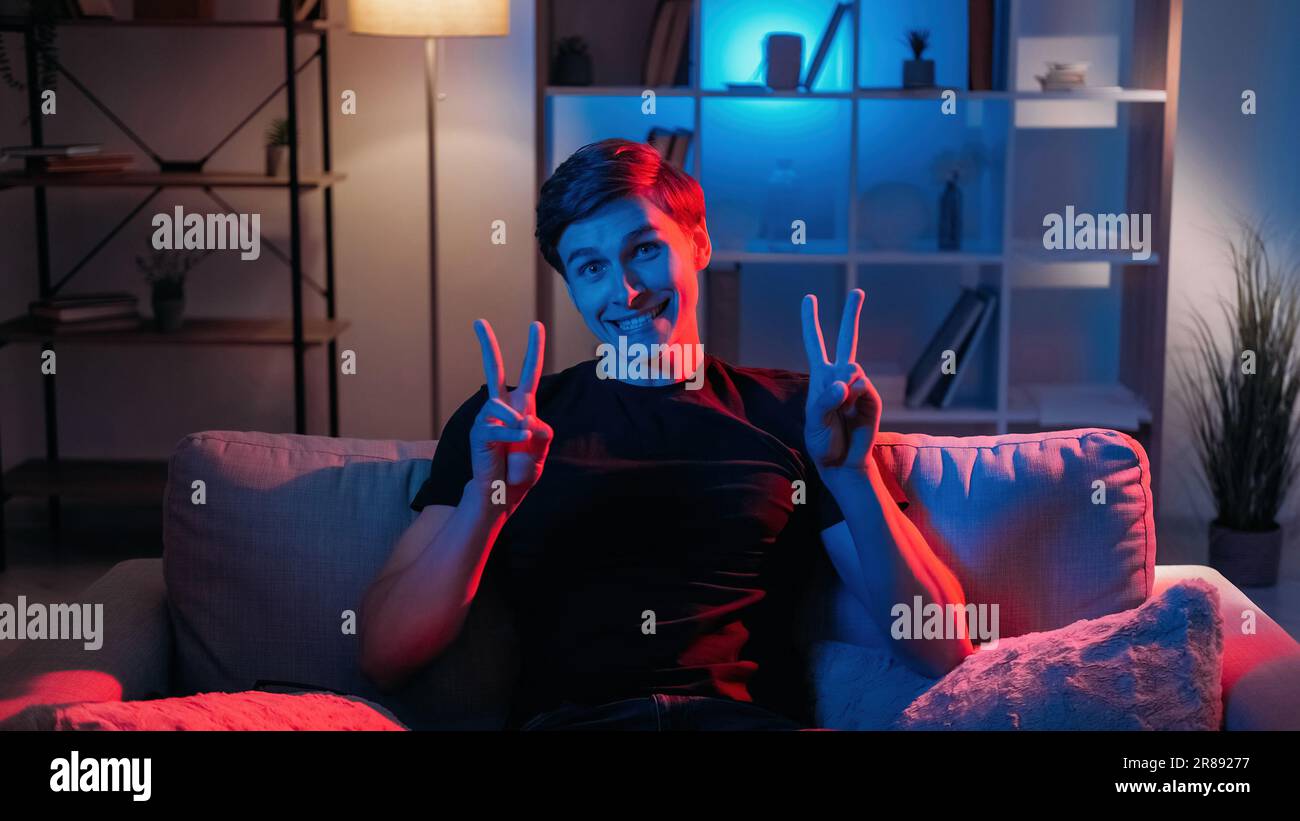 Peace gesture funny man meme expression happy Stock Photo - Alamy