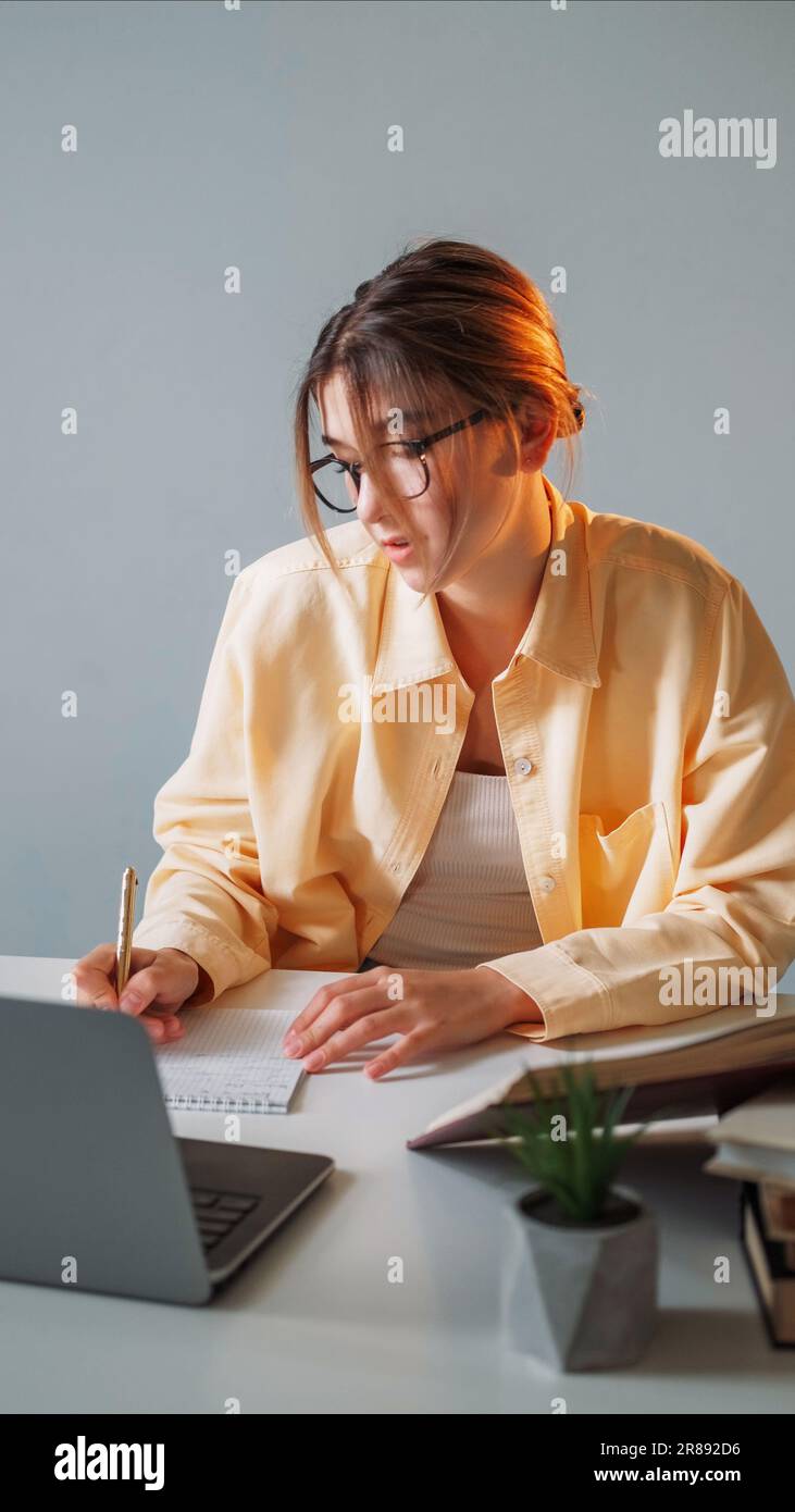 Female student distance education homework doing Stock Photo - Alamy