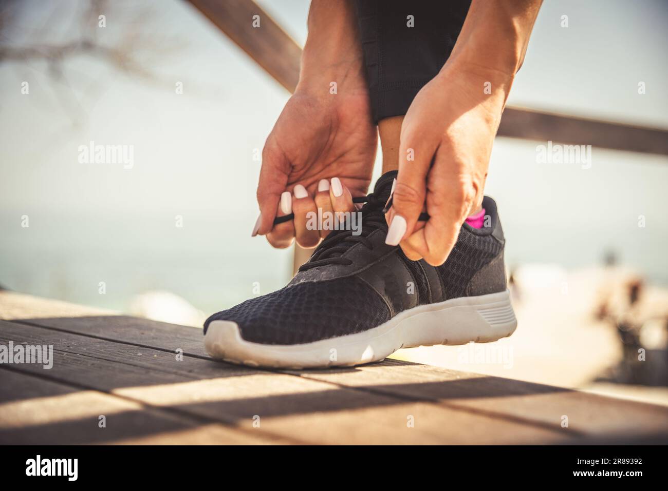 feet running on road closeup on shoe Stock Photo - Alamy