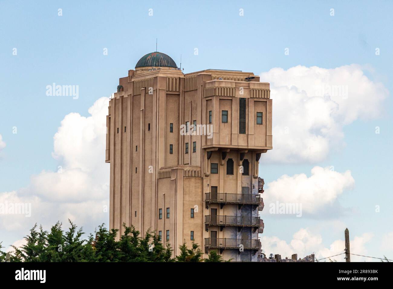 An aerial view of a beautiful building with a clock tower on top ...