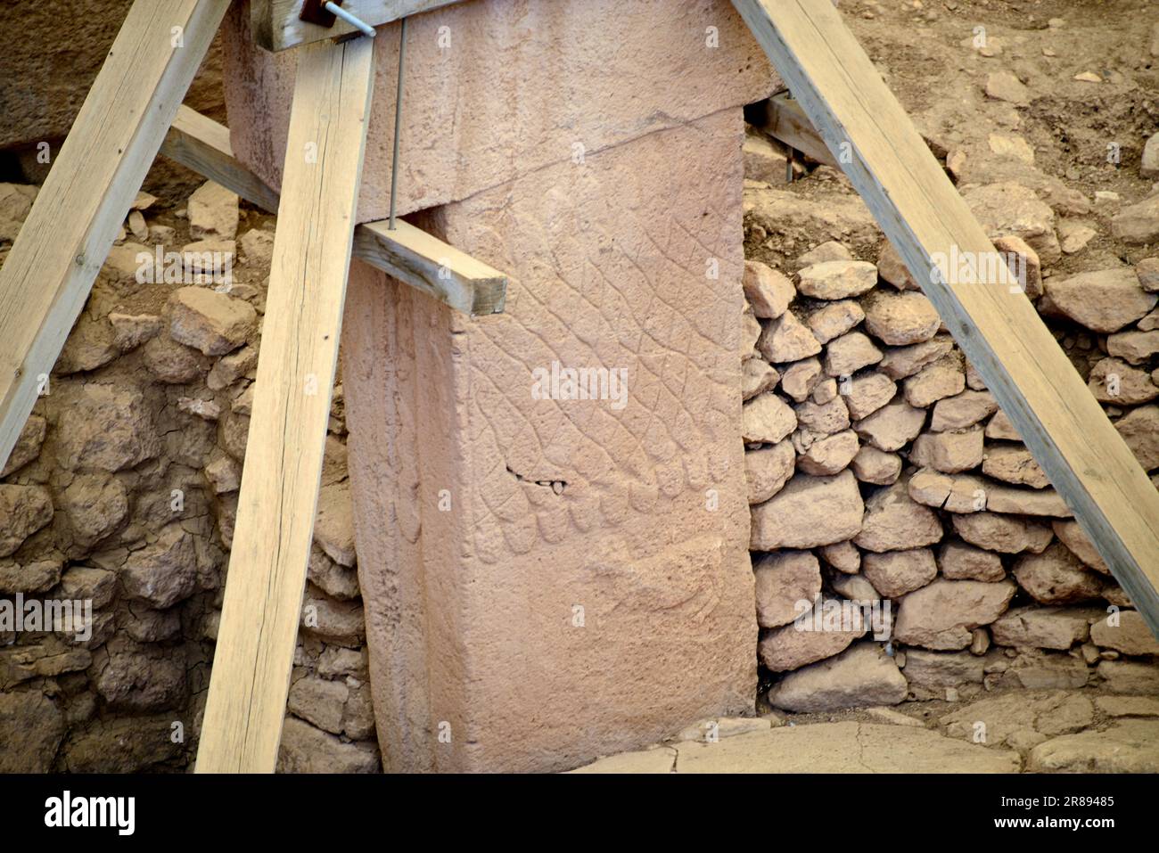 Göbekli Tepe is an archaeological site, located about 18 km northeast ...