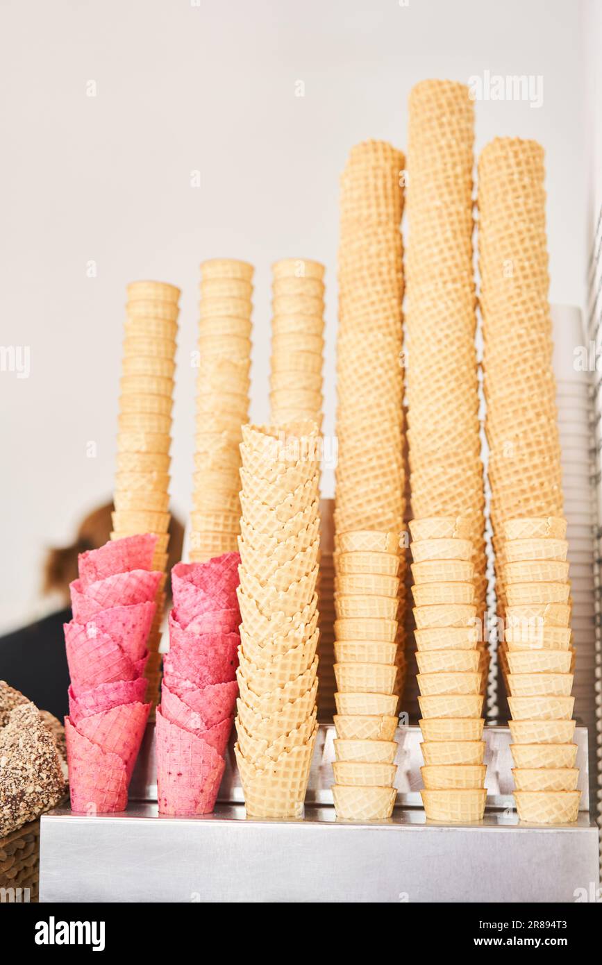 blank ice cream wafers. Waffle cones in an ice-cream shop, Italy. A ...