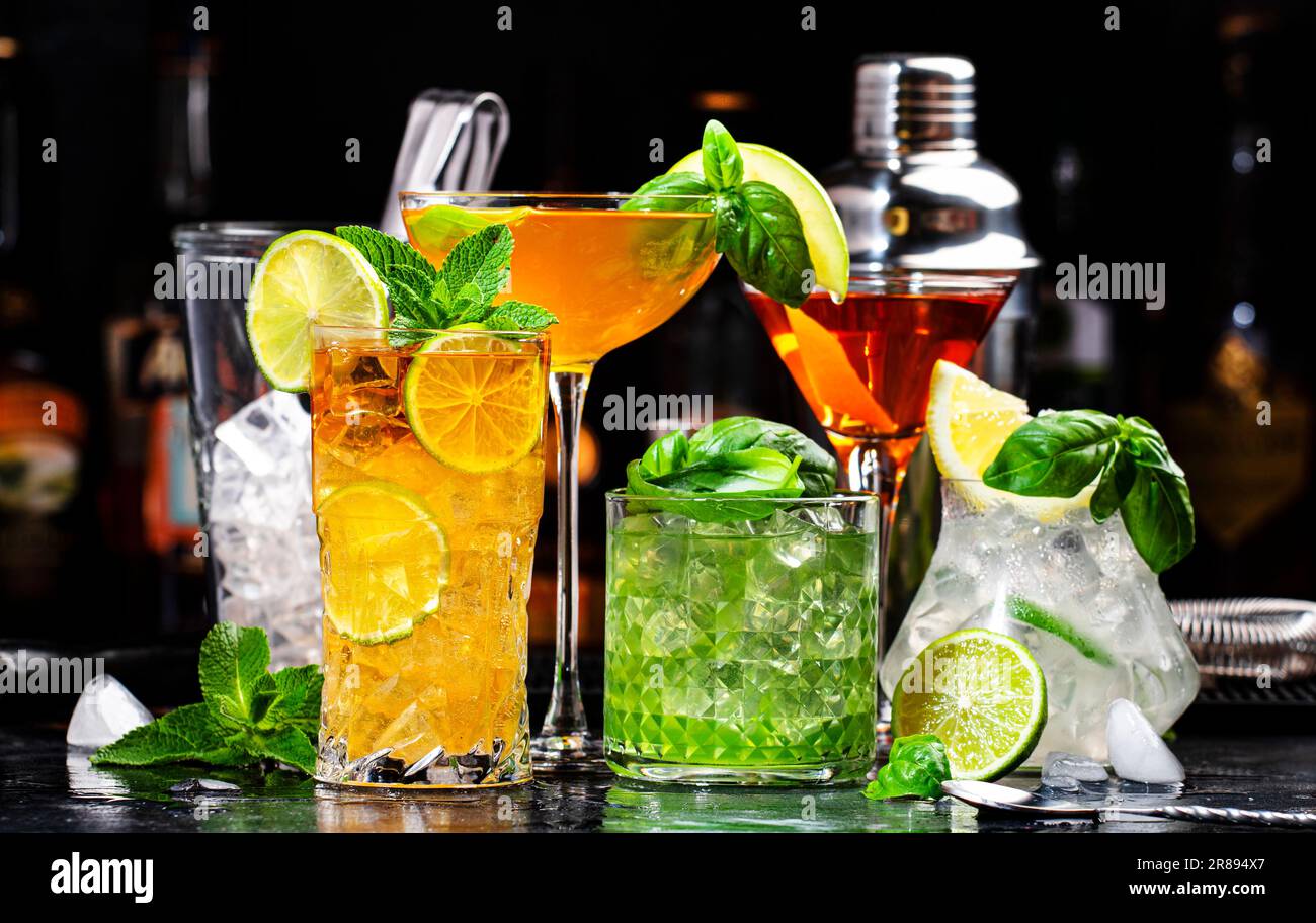 Cocktail party, alcohol drinks with gin, whiskey, vermouth and liquor ...