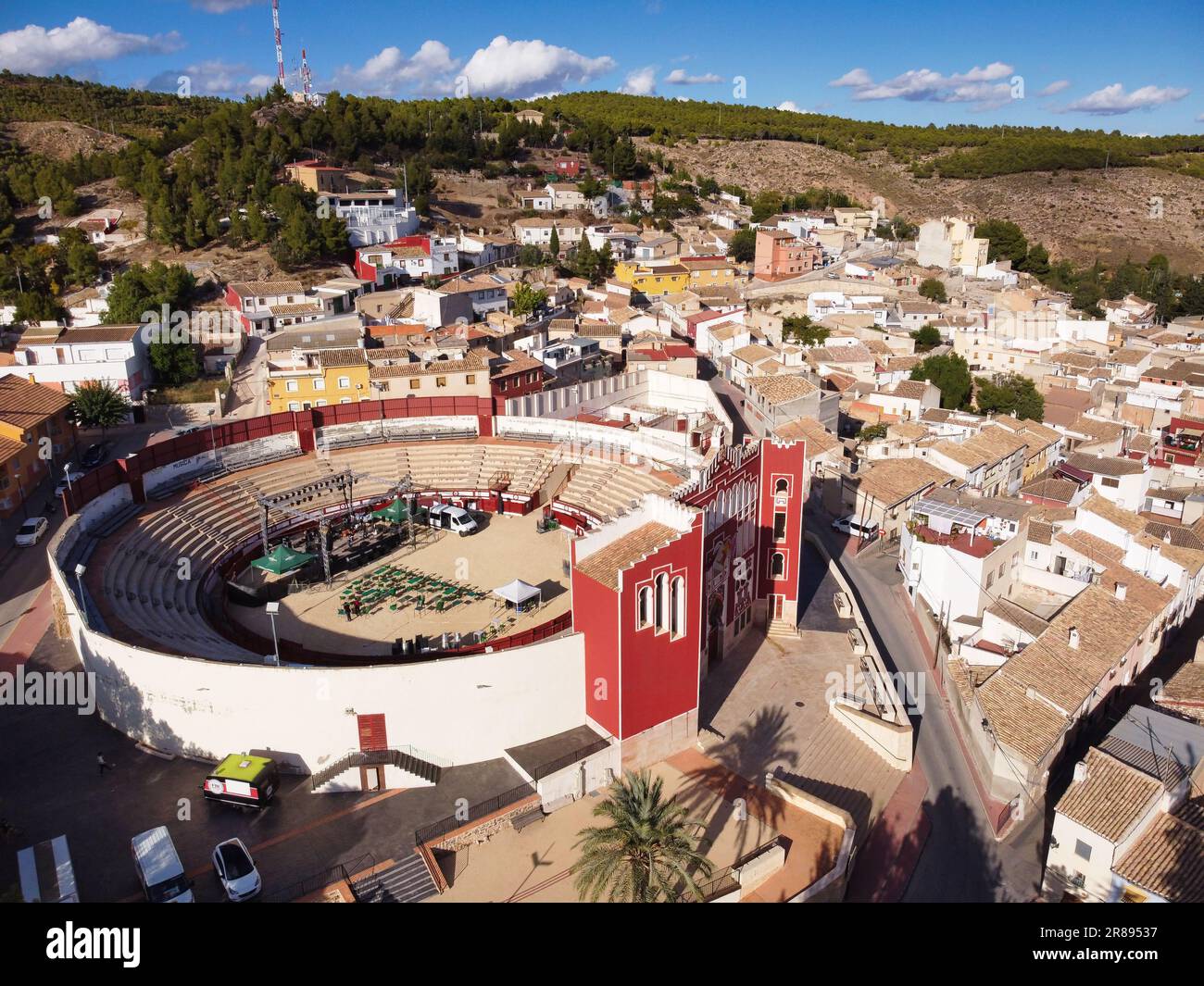 Aerial view of an outdoor arena with a large, circular structure ...