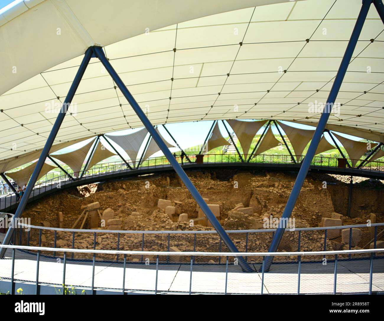 Göbekli Tepe is an archaeological site, located about 18 km northeast ...
