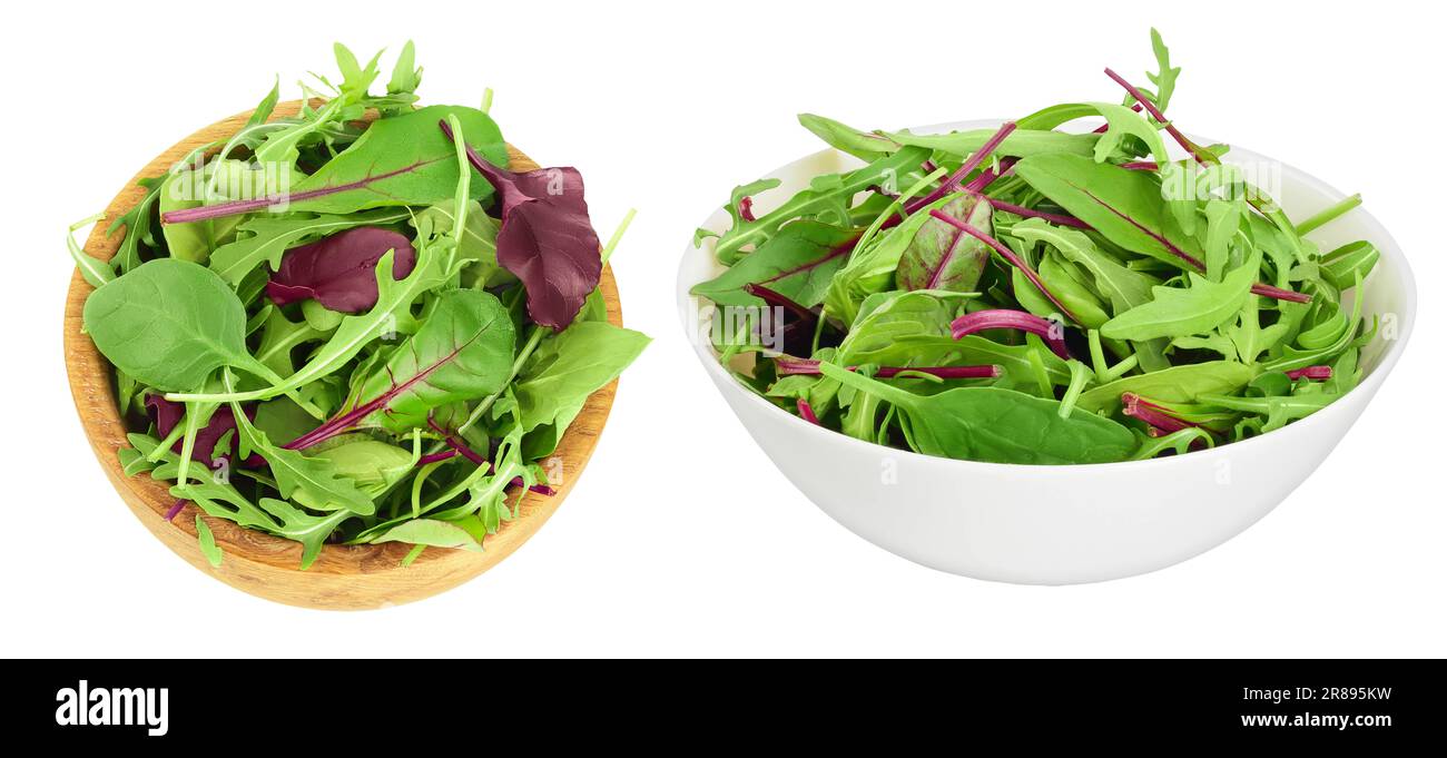 Mix salad - arugula, spinach and chard in wooden bowl isolated on white ...