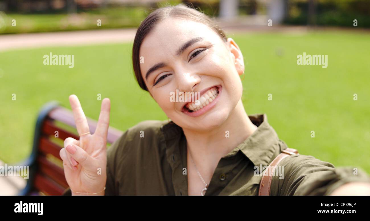 Selfie, hand gesture and face of woman at park taking pictures for ...