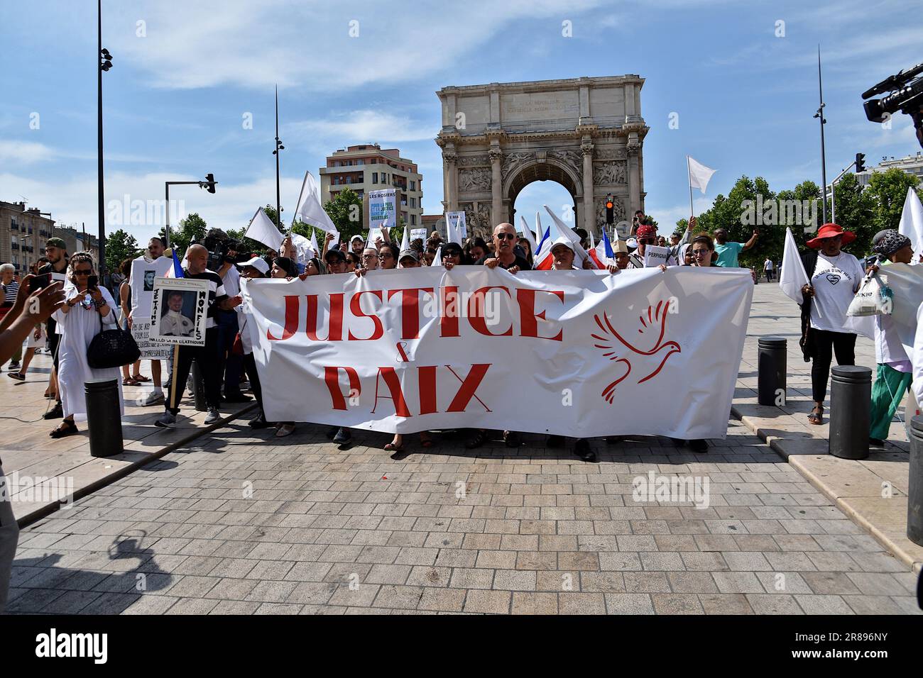 Protesters hold a banner expressing their opinions during the ...