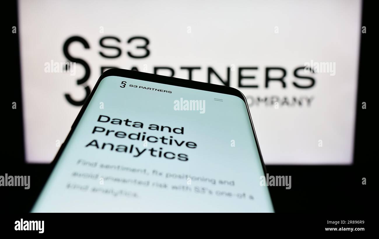 Mobile phone with webpage of US data analytics company S3 Partners LLC ...