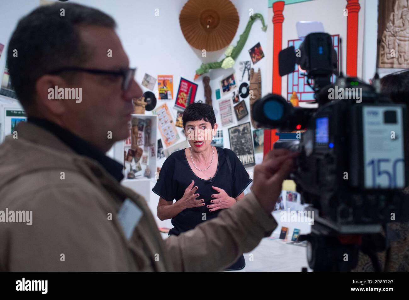 One of the curators of the show Teresa Velazquez speaks during the opening of the exhibition ...