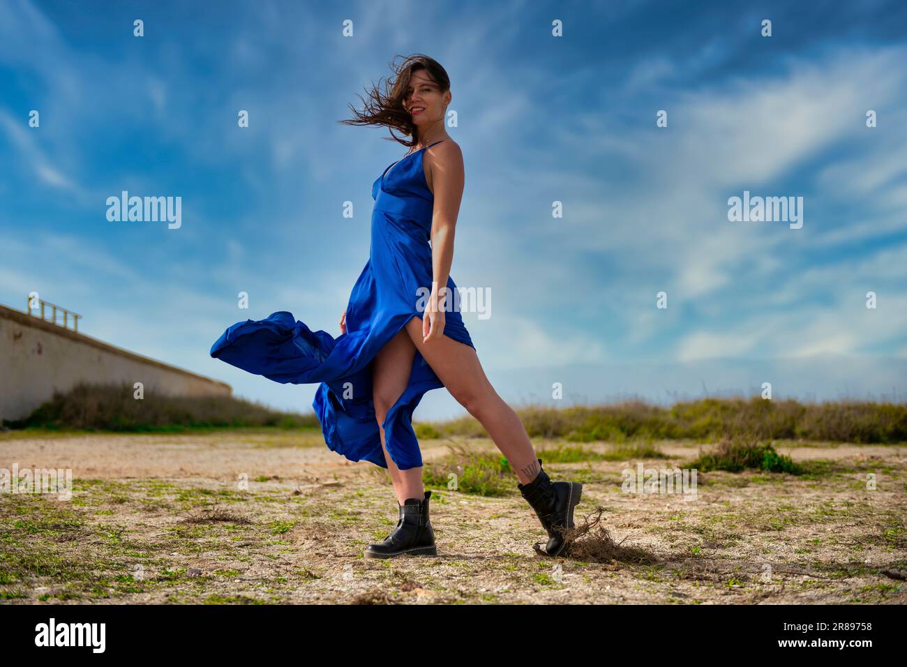 Girl Standing In The Wind