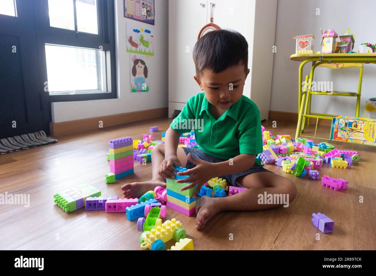 Boy playing with lego top view hi-res stock photography and images - Alamy