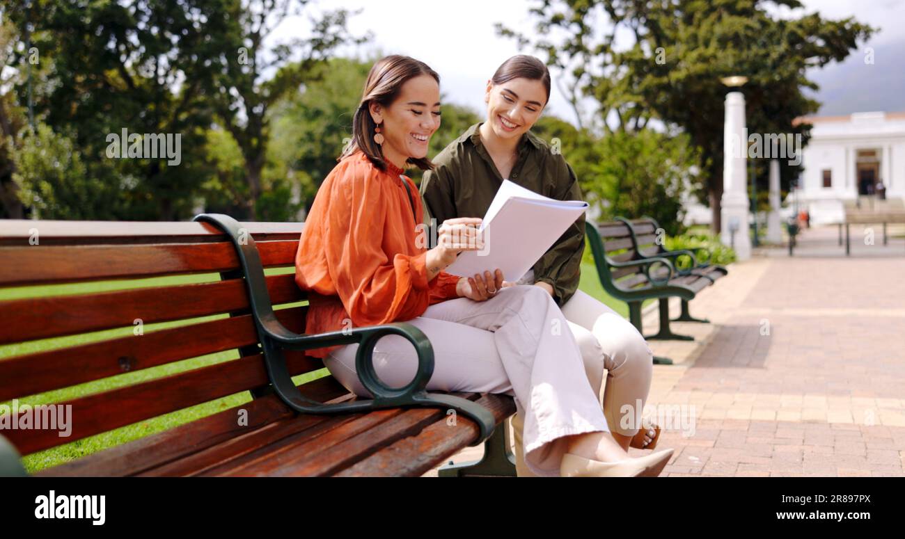 Women, friends and laughing at park on bench, bonding and talking ...