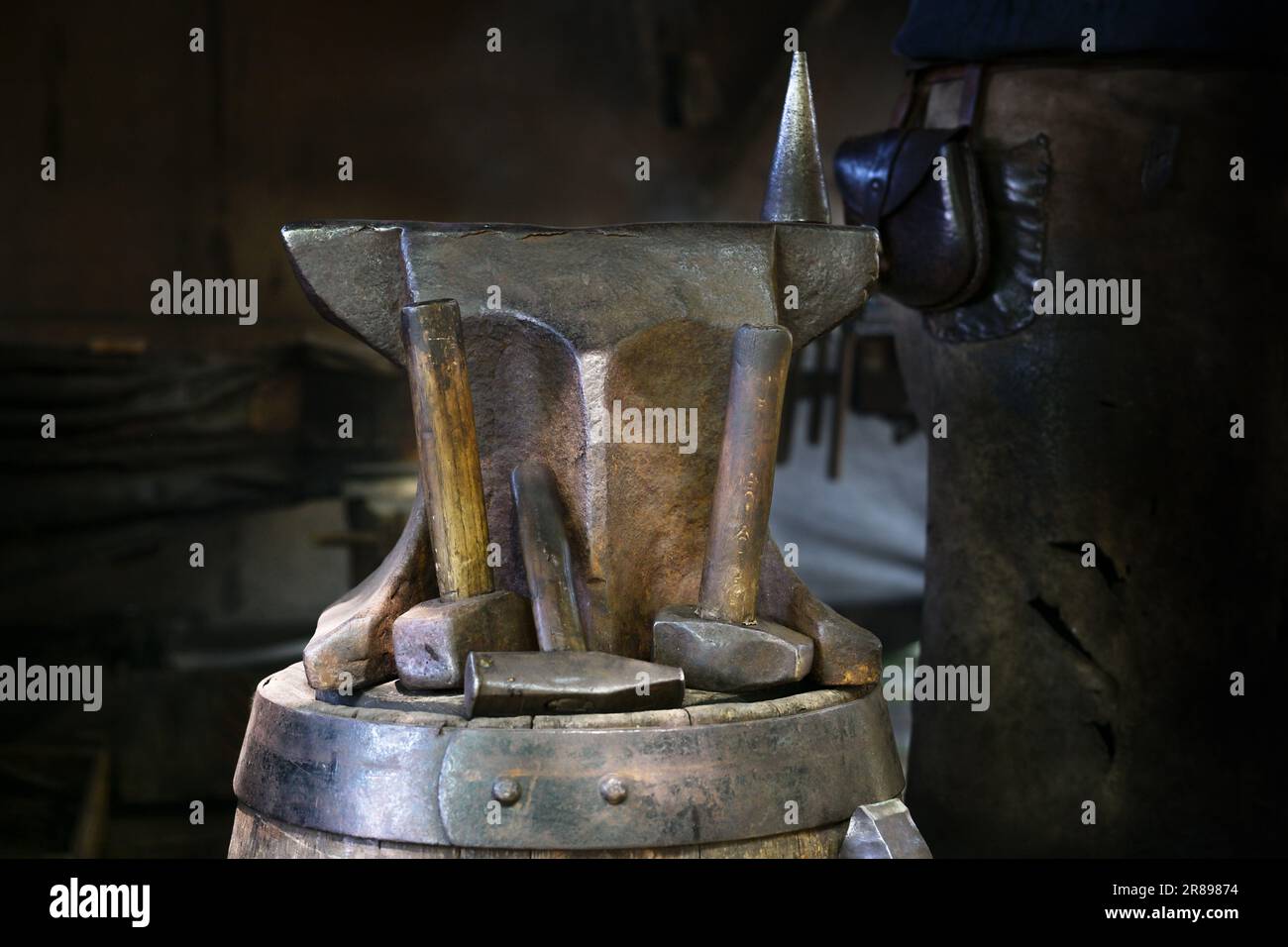 Anvil and various hammers in a portable blacksmith workshop, forge ...
