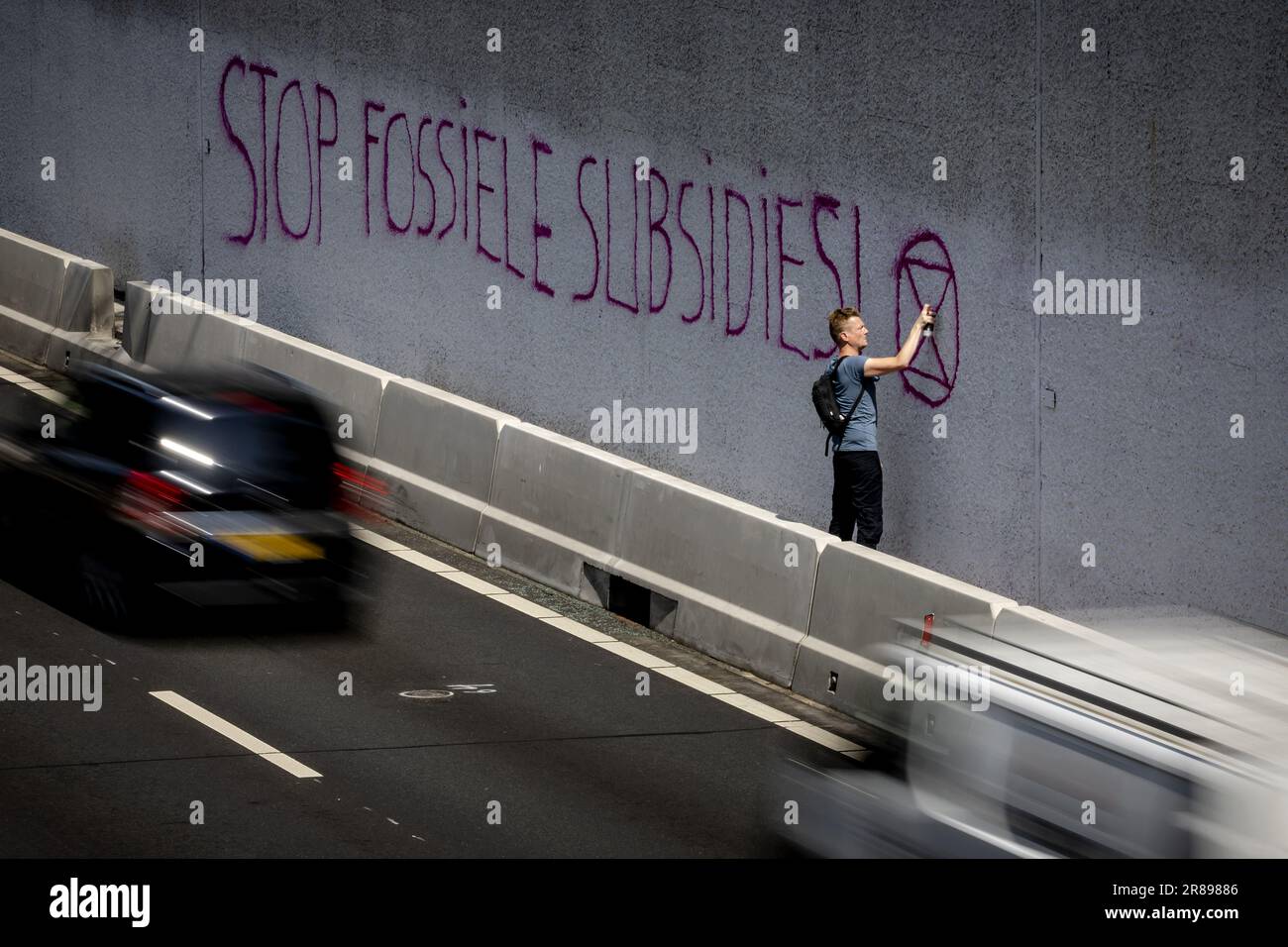 THE HAGUE - Members of the protest group defaced the tunnel of the A12 ...