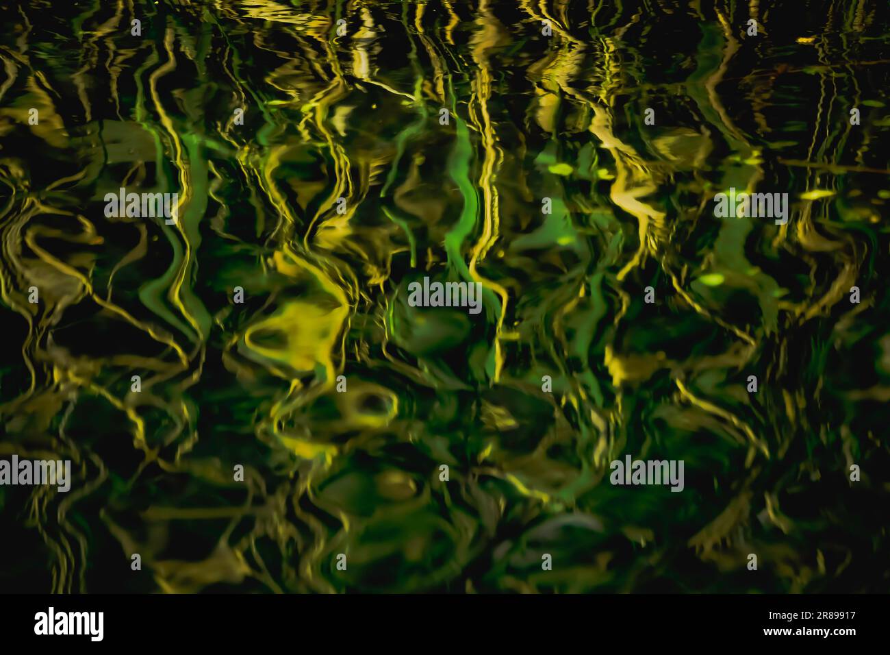 green color reflections on the river close up photography abstract ...