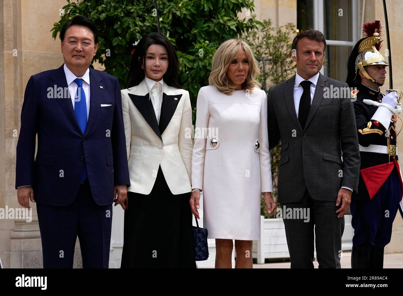 French President Emmanuel Macron, right, his wife Brigitte Macron ...
