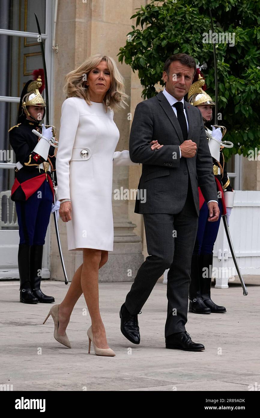 French President Emmanuel Macron and his wife Brigitte Macron wait for ...