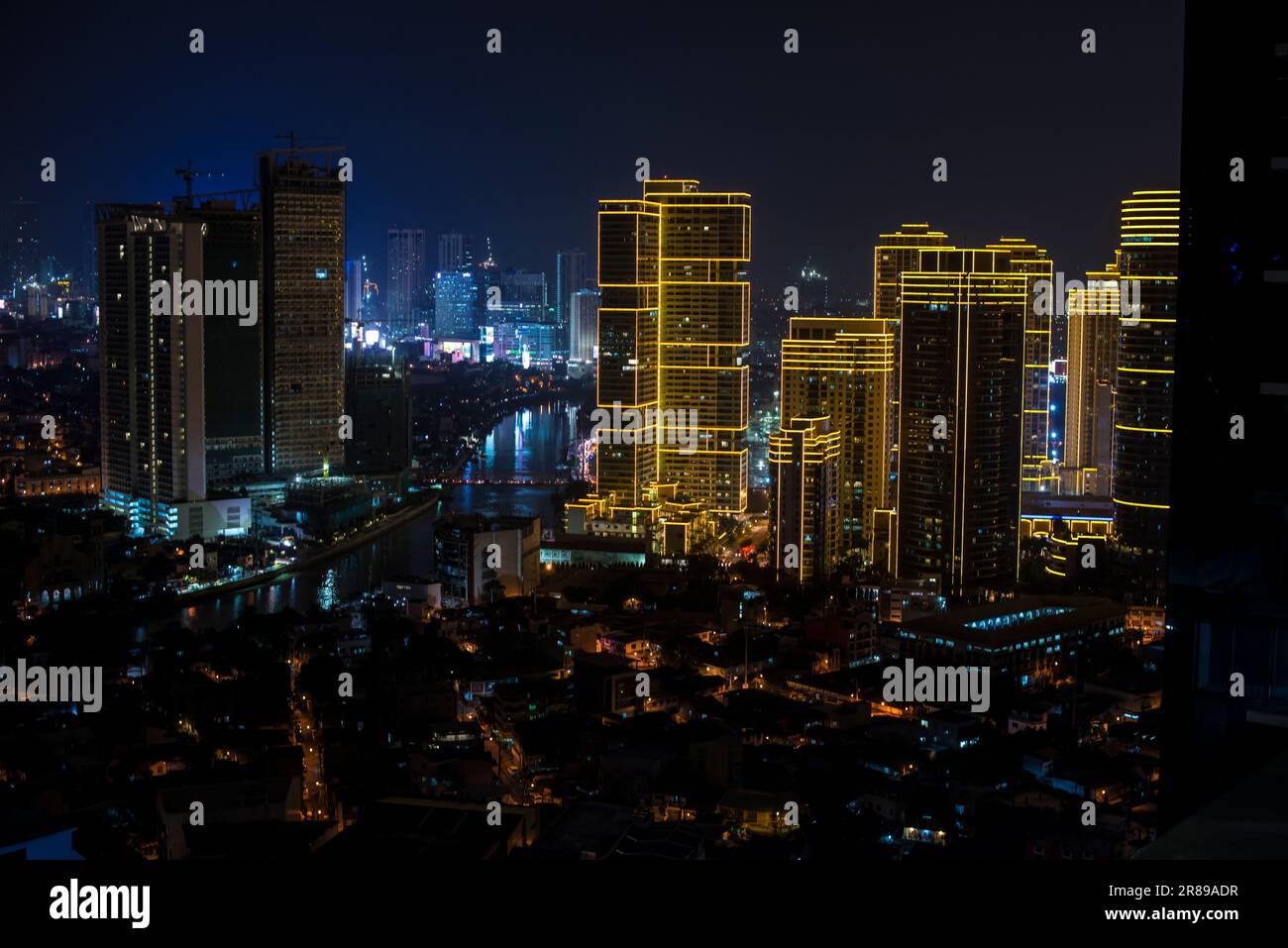 Manila at night Stock Photo - Alamy