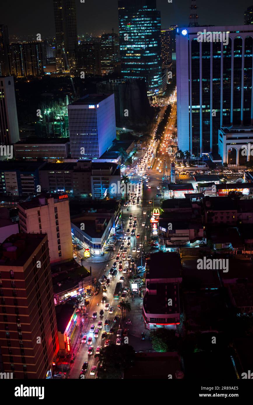 Manila at night Stock Photo - Alamy
