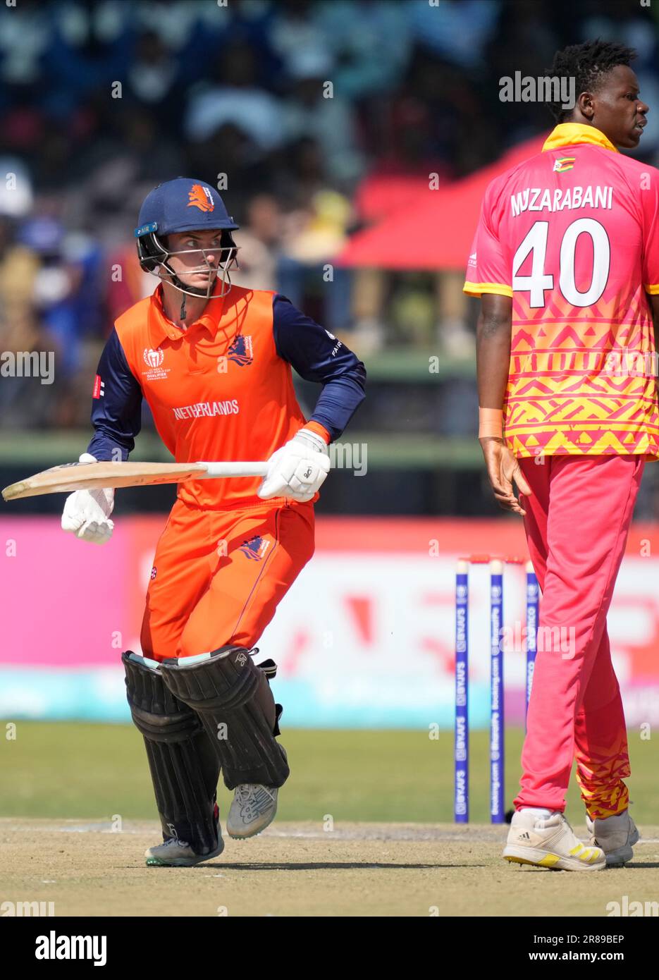 Netherlands batsman Scott Edwards, left, in action during their ICC Men ...