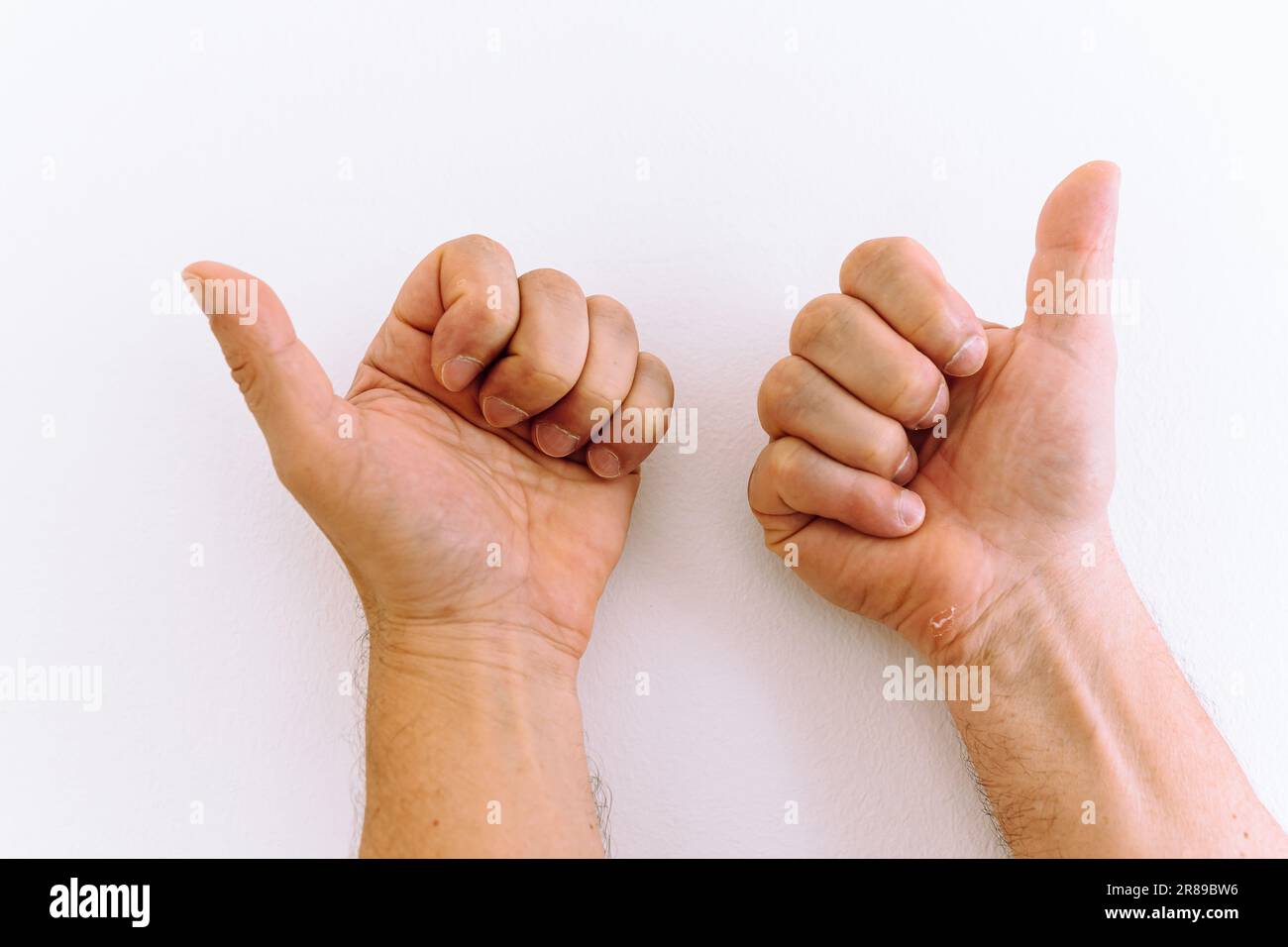 Male hands with calluses, palms forward, fingers bent Stock Photo - Alamy