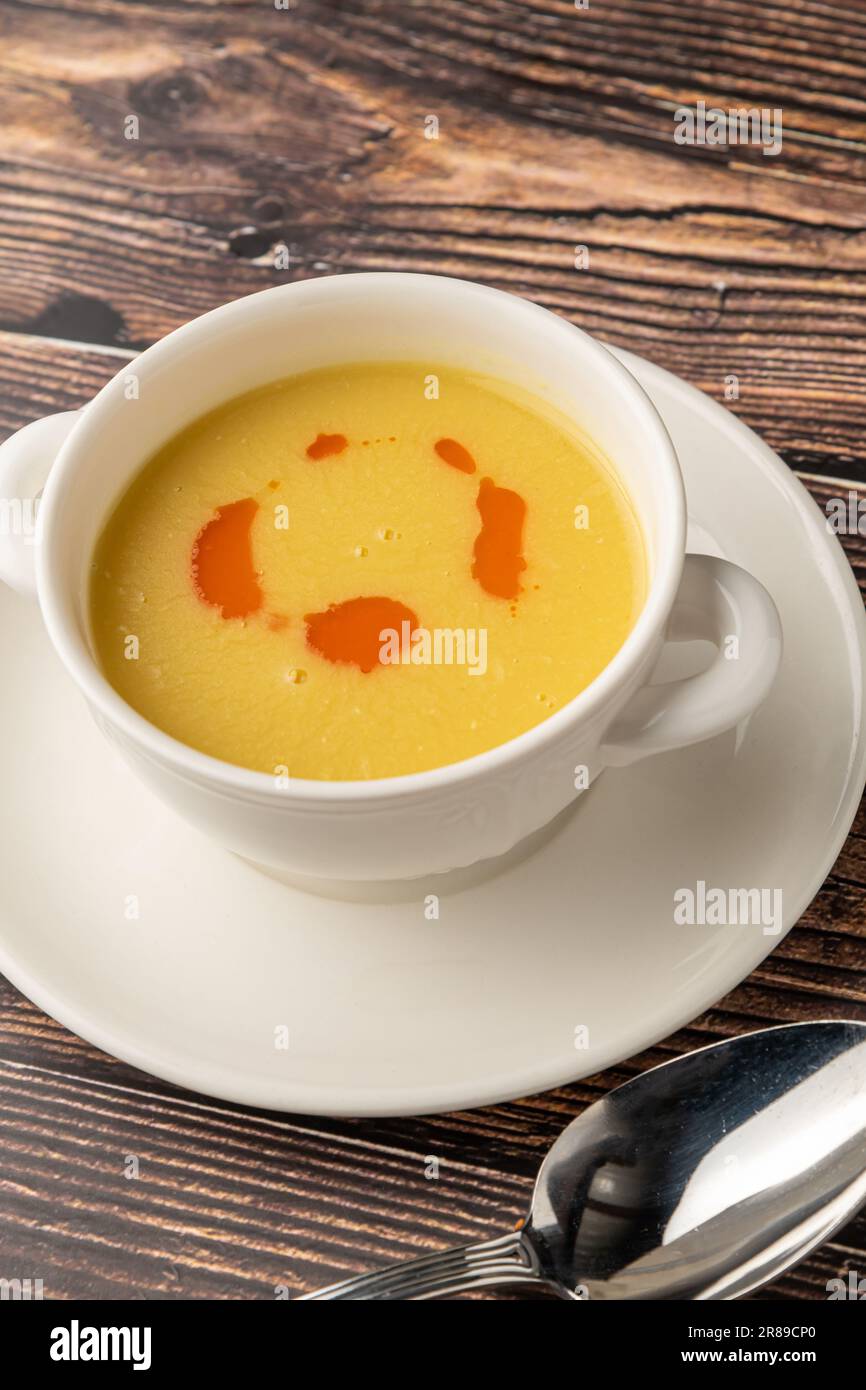 Strained lentil soup on a white porcelain plate Stock Photo - Alamy