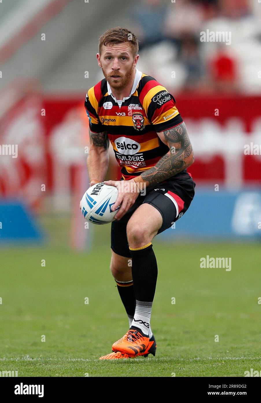 Salford Red Devils' Marc Sneyd kicks away during the Betfred Challenge ...