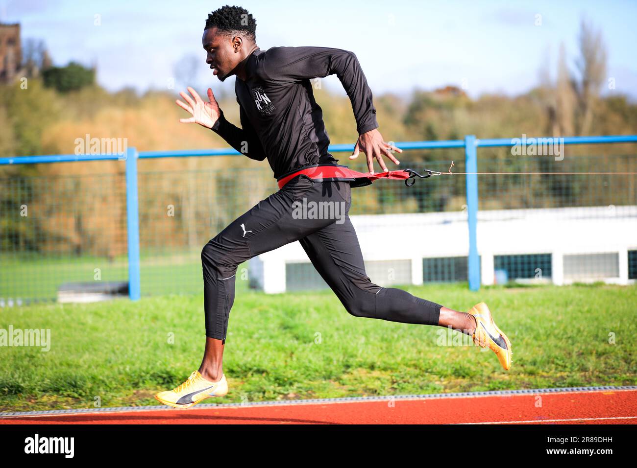 Athlete running on the track Stock Photo - Alamy