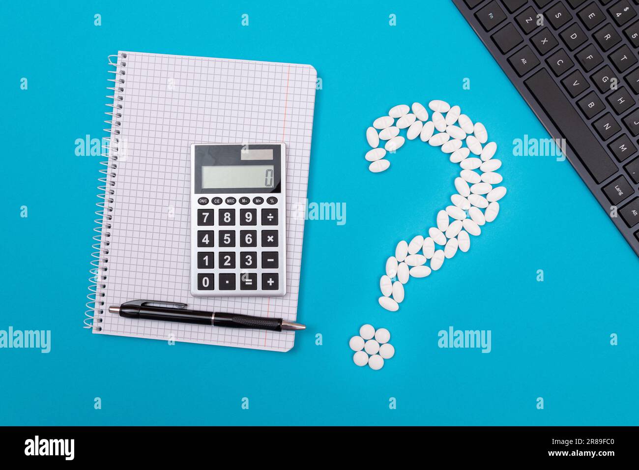 Treatment Costs and Budget. Question Mark Made from White Pills and ...