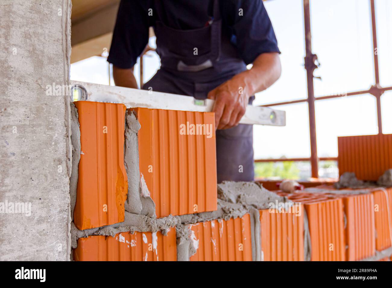 Spool of construction string line placed in red blocks. Tool to help ...