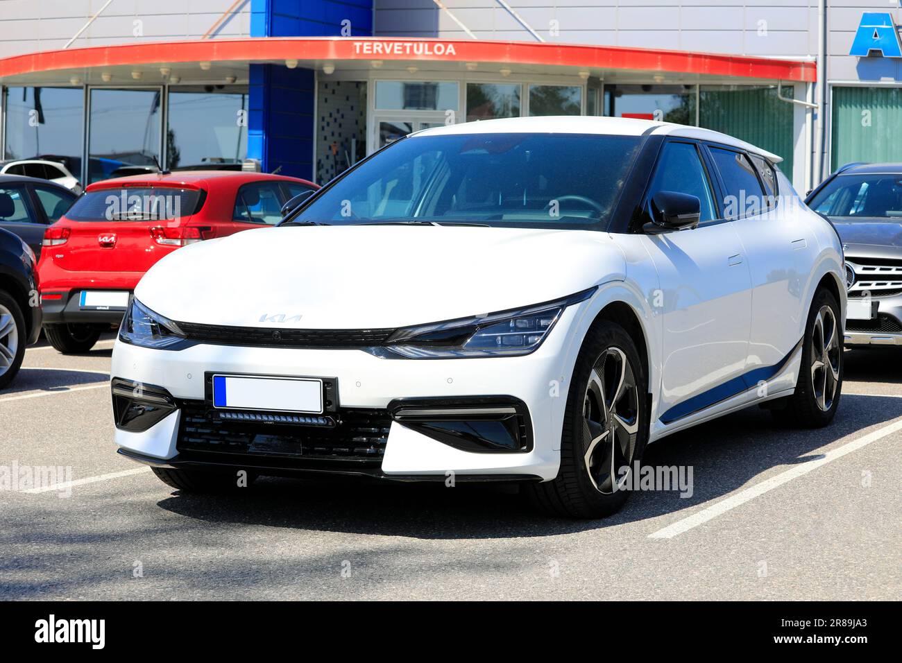 White Kia EV6 fully electric crossover car, year 2022, parked at the ...