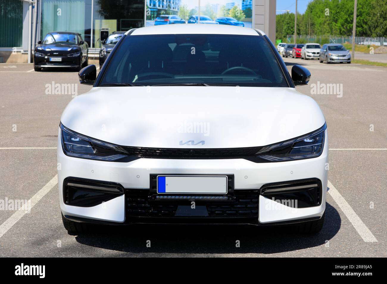 White Kia EV6 fully electric crossover car parked at the new car ...