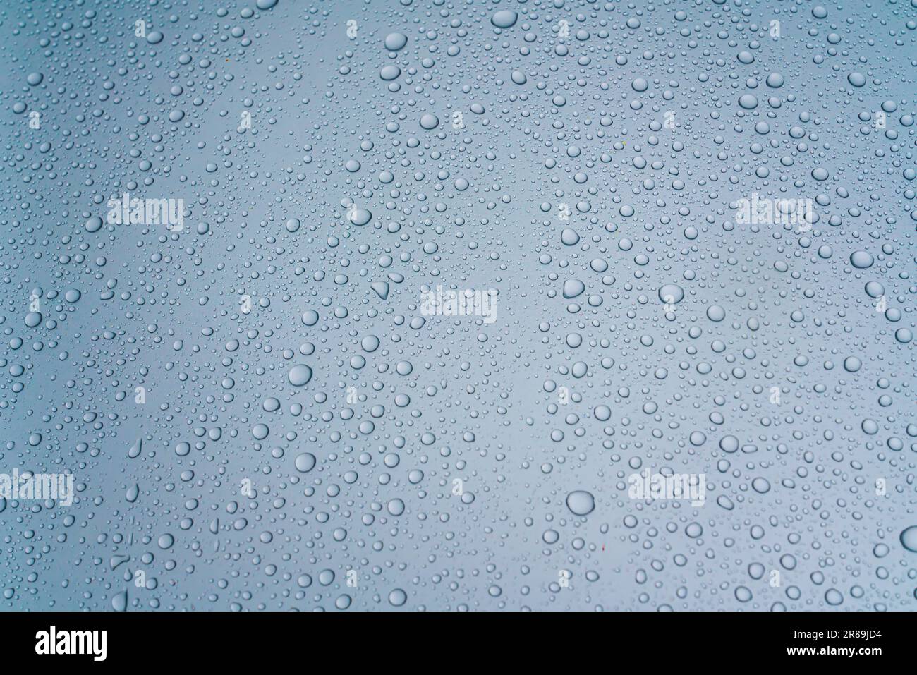Background - water droplets on the surface of light blue color Stock ...