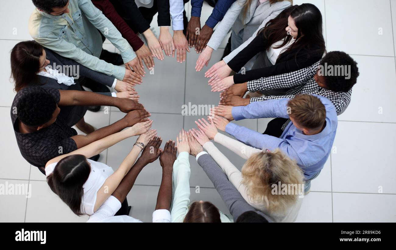 Business people stretched out their hands towards each other while ...